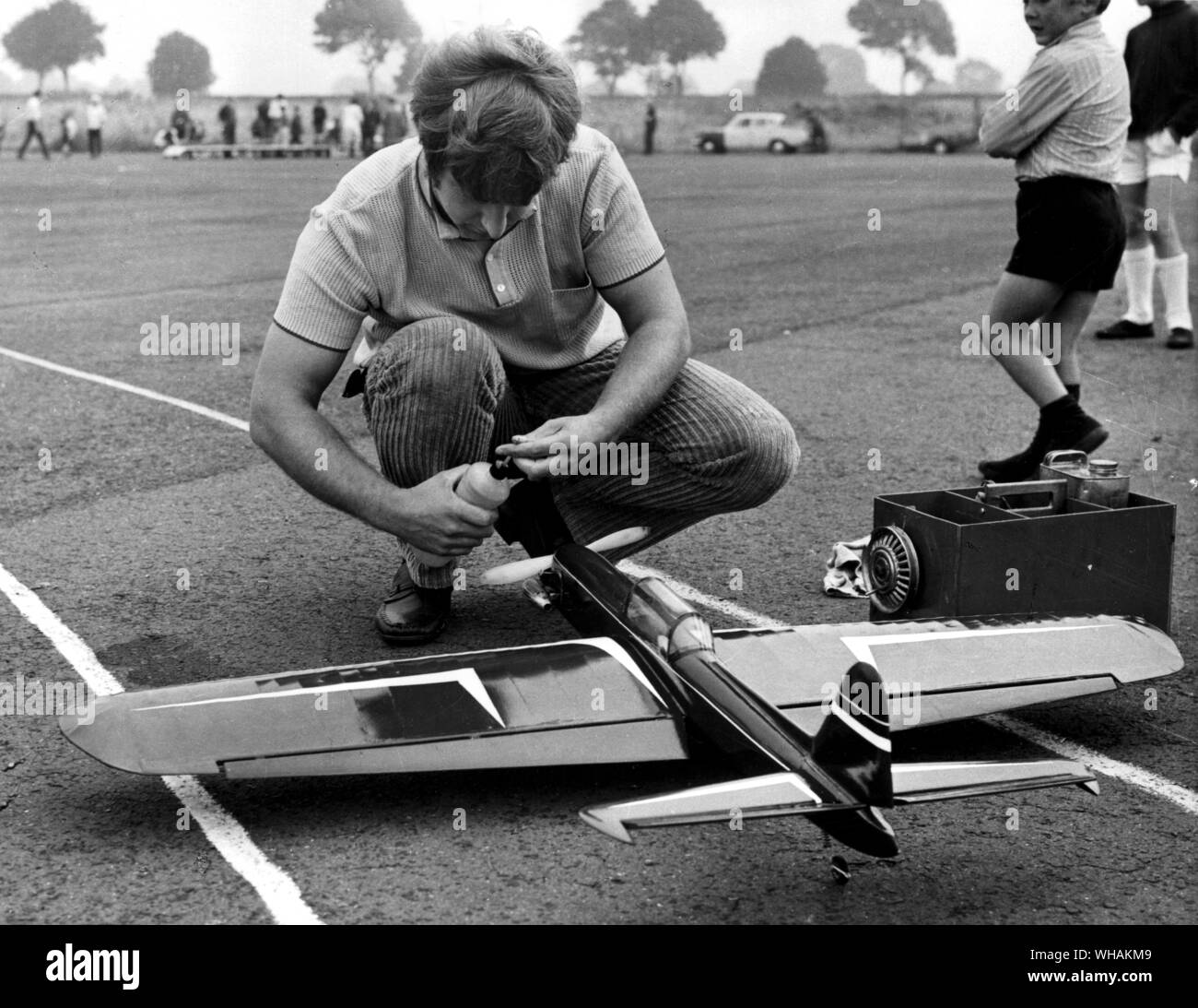A control line scale model of a De Havilland Chipmunk being refuelled ...