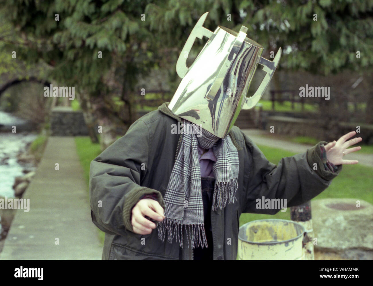 Man With Metal Object On Head Stock Photo - Alamy