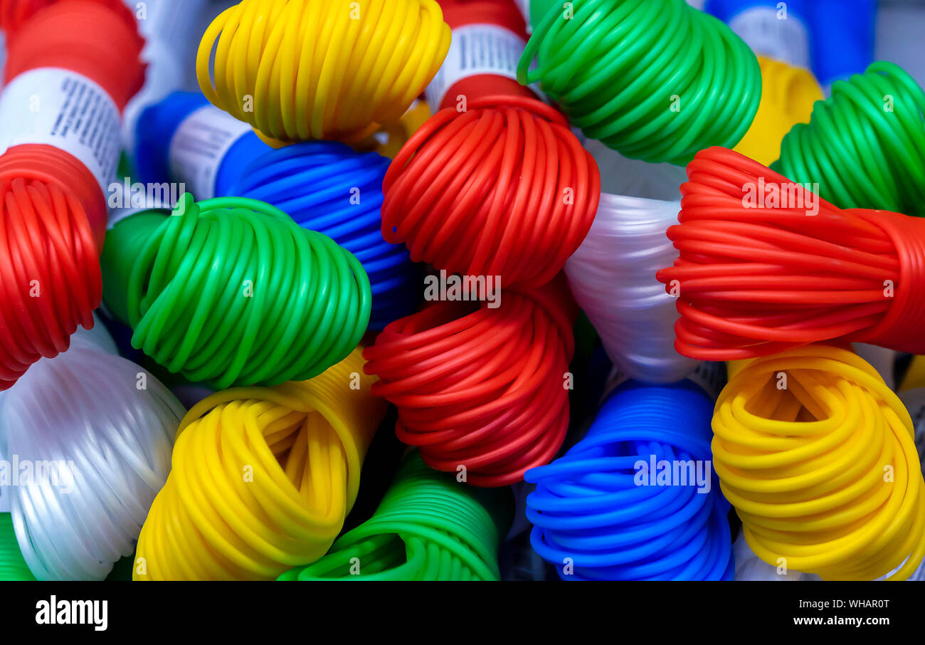 Colored plastic rope. Multicolored plastic wires in bundles Stock Photo ...