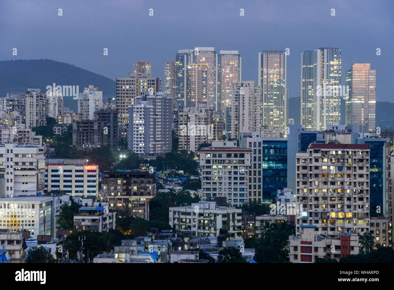 INDIA, Mumbai, illuminated windows of skyscraper in suburb Goregoan ...