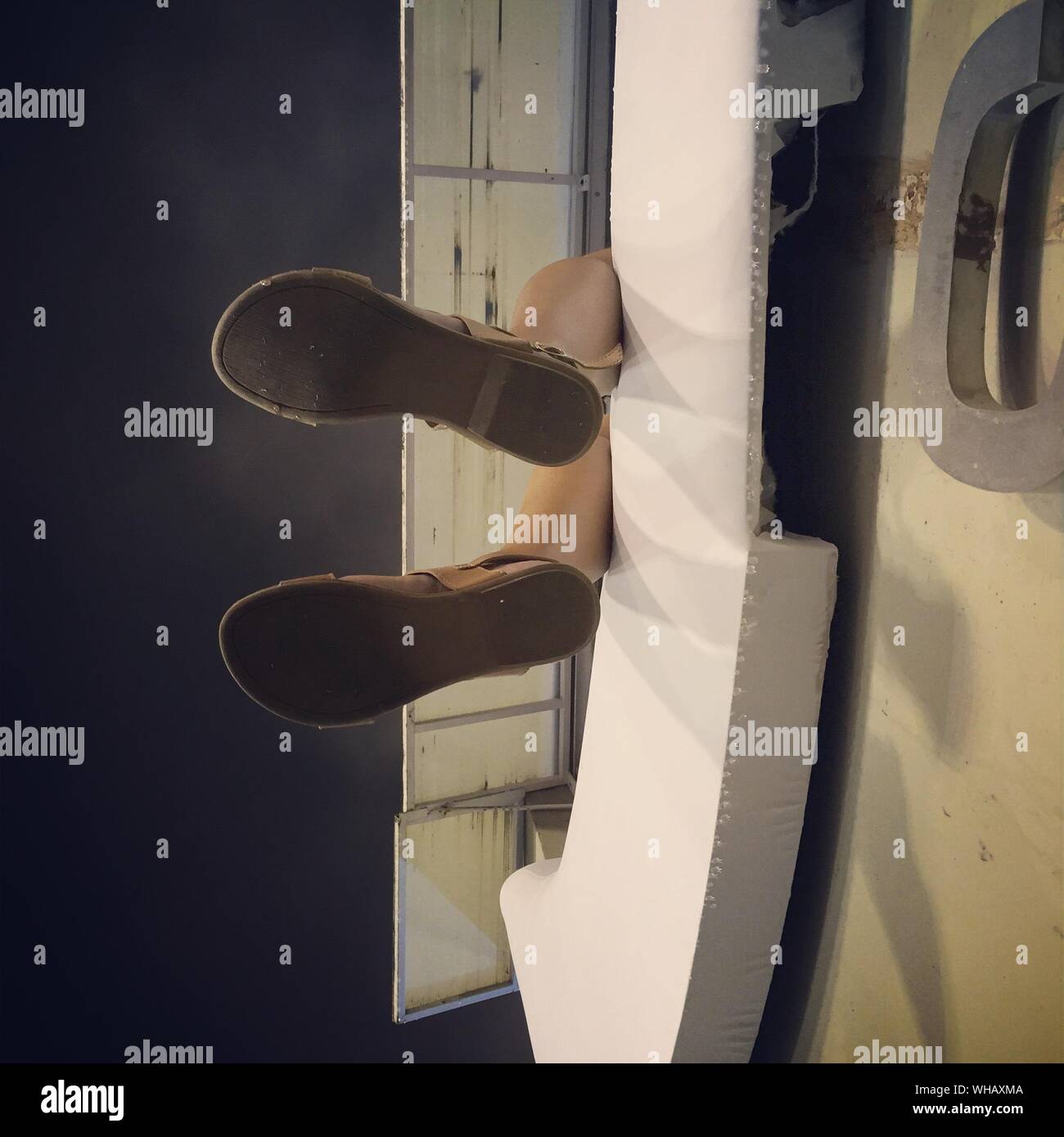 Dangling legs hi-res stock photography and images - Alamy