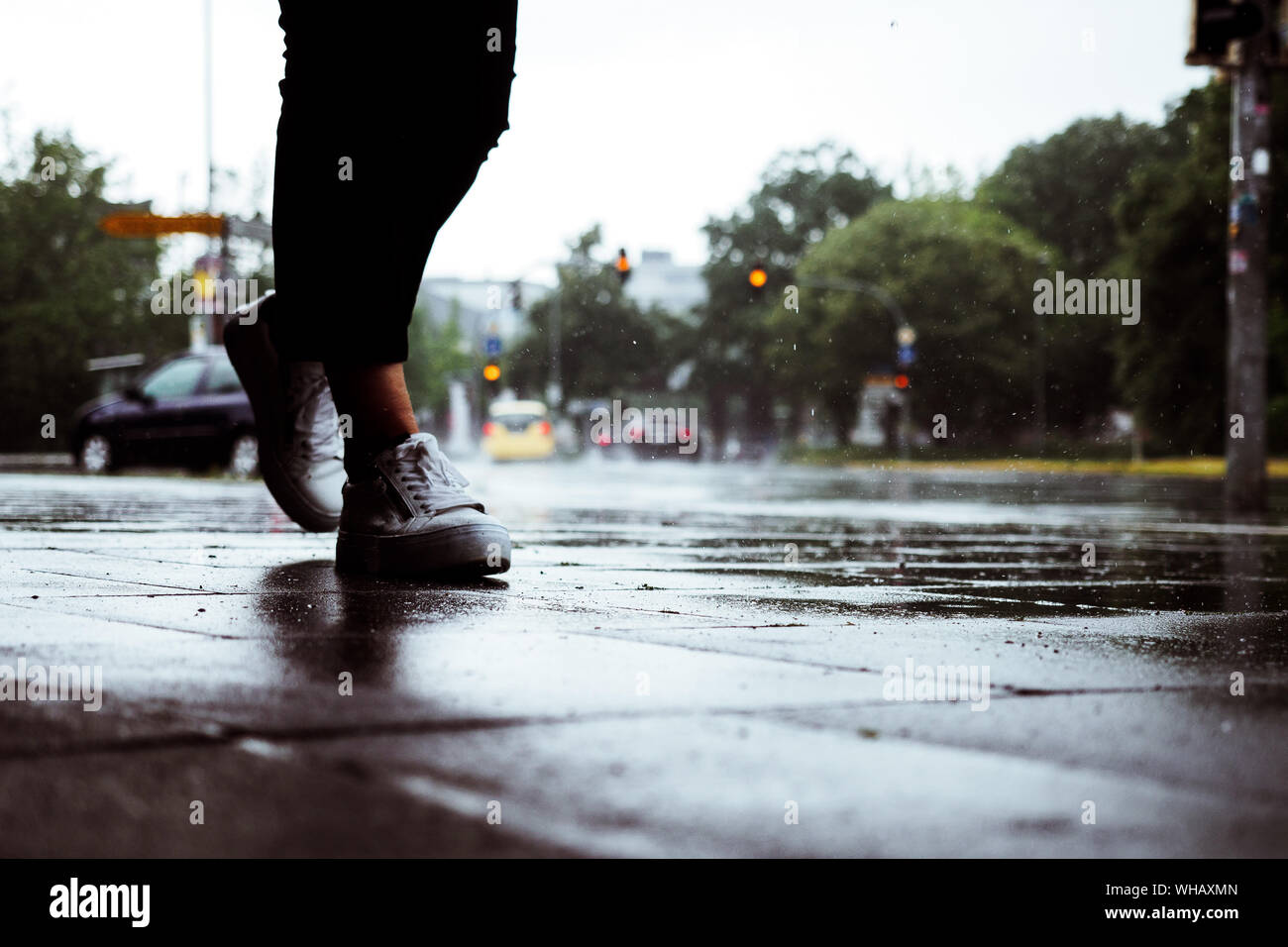 Woman walking rain hi-res stock photography and images - Alamy