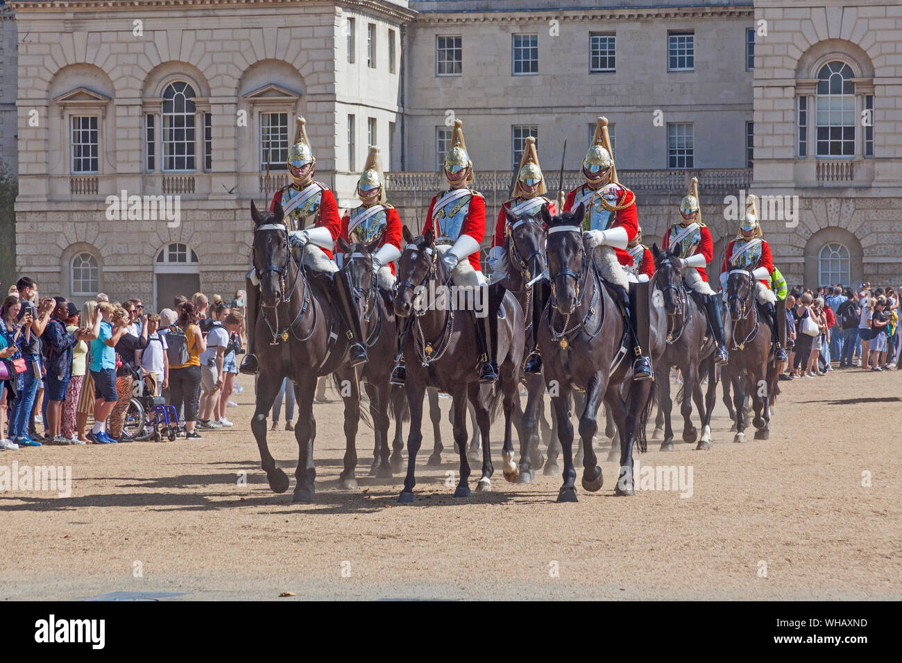 London, Westminster. A troop of Royal Life Guards leaving Horse Guards ...