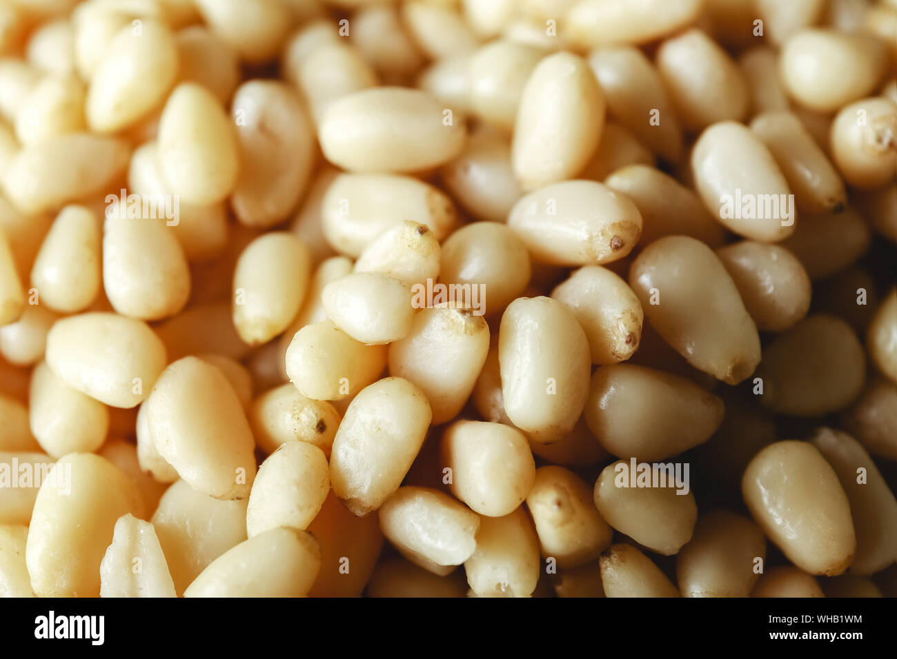 Background texture of shelled pine nuts Stock Photo - Alamy