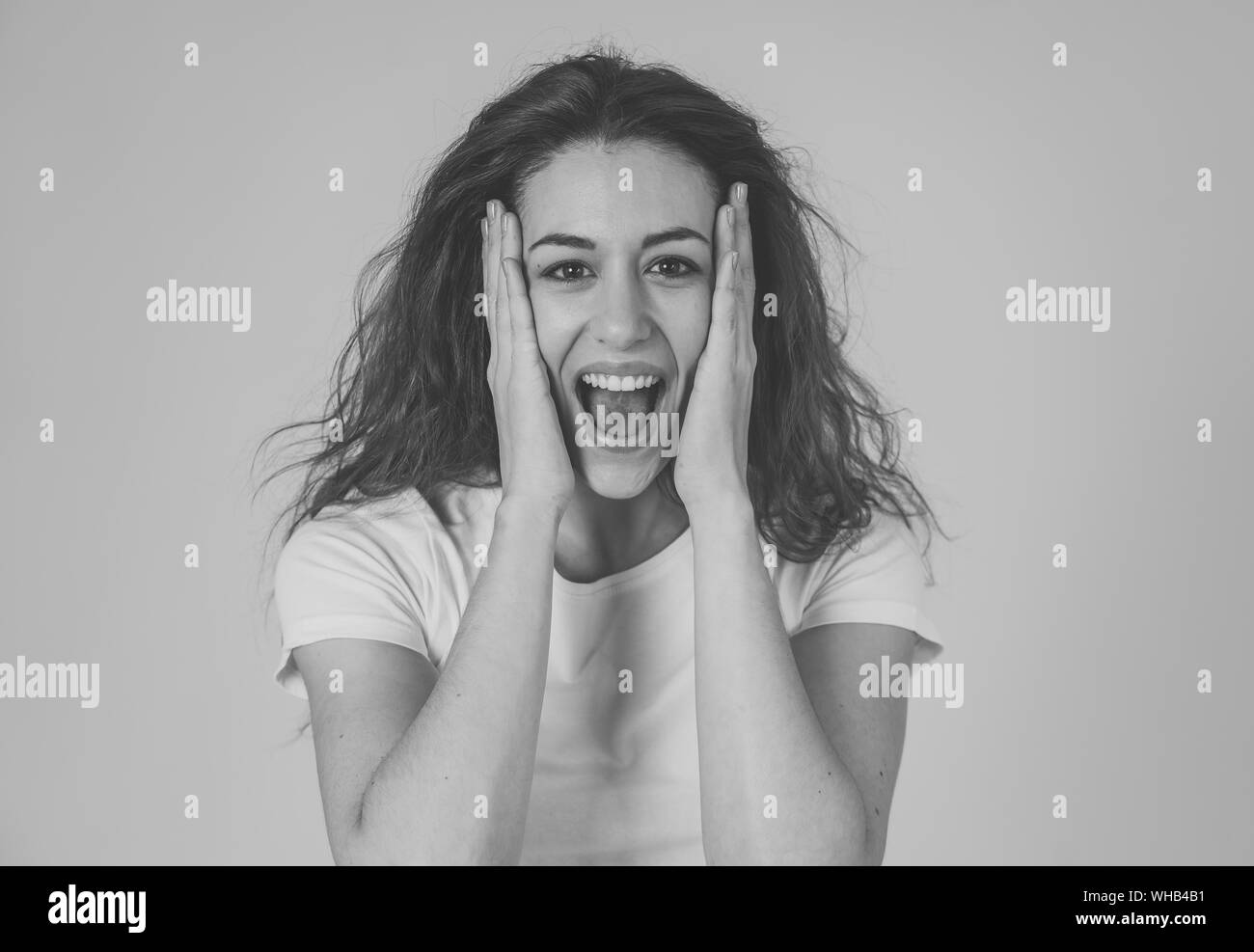 Beautiful young red hired woman with happy face making surprised ...