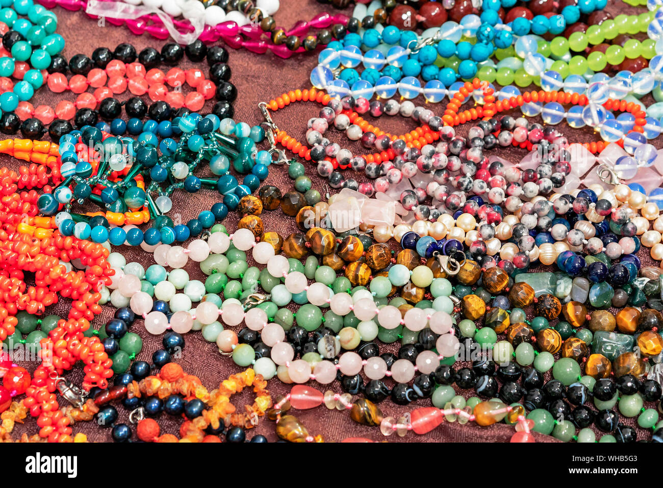 Beads from natural stones hi-res stock photography and images - Alamy