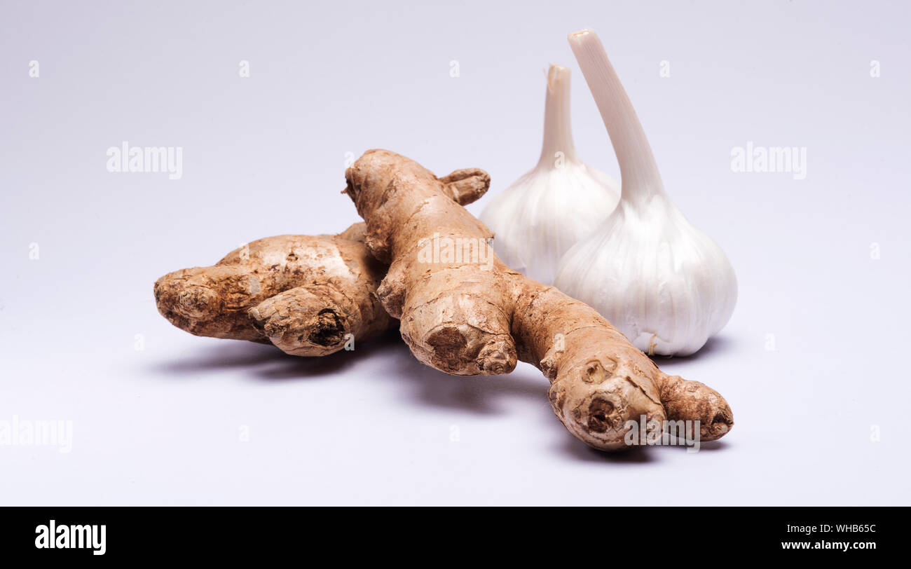 Ginger and garlic on a isolated white background Stock Photo - Alamy