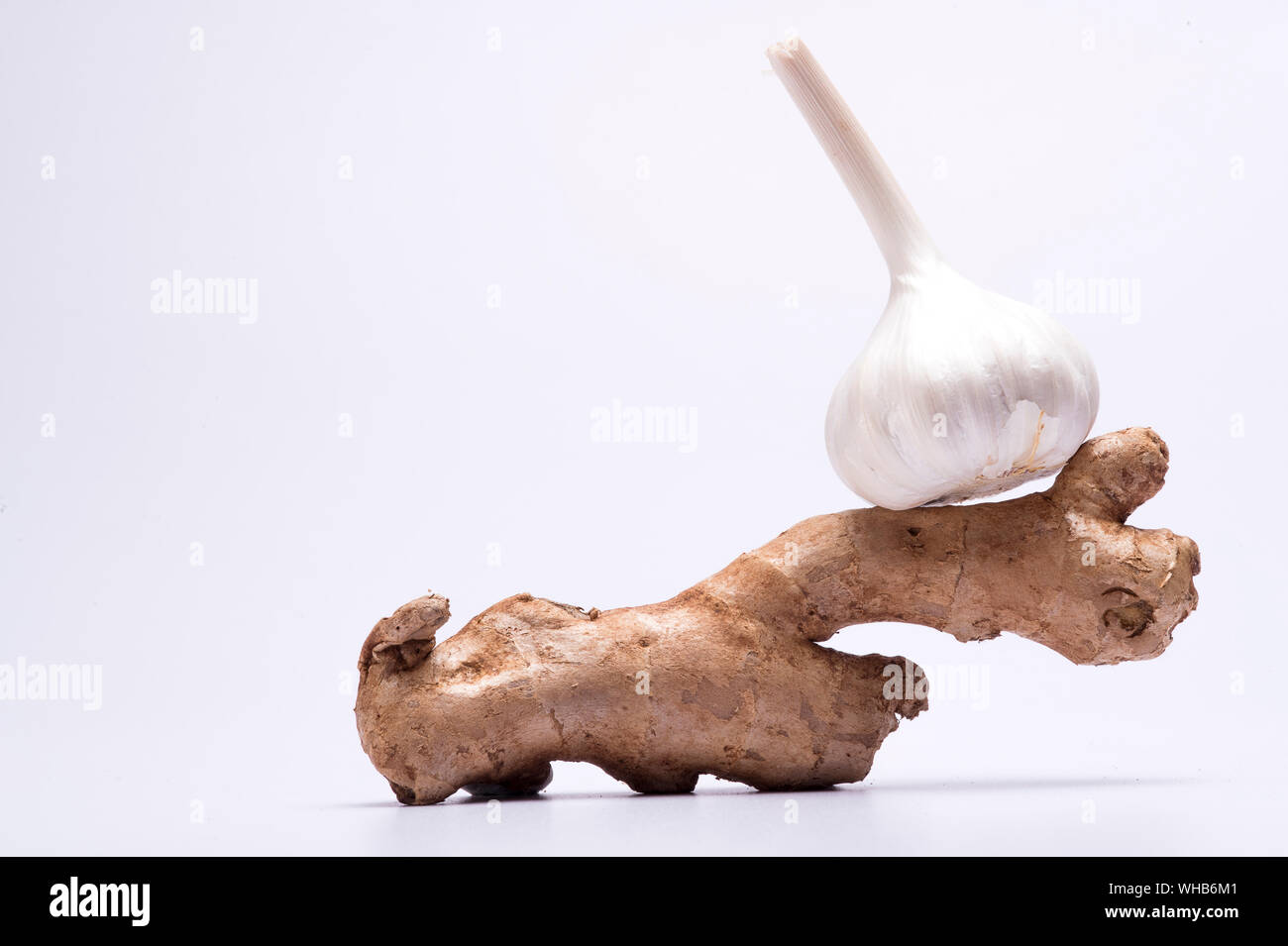 Ginger and garlic on a isolated white background Stock Photo - Alamy