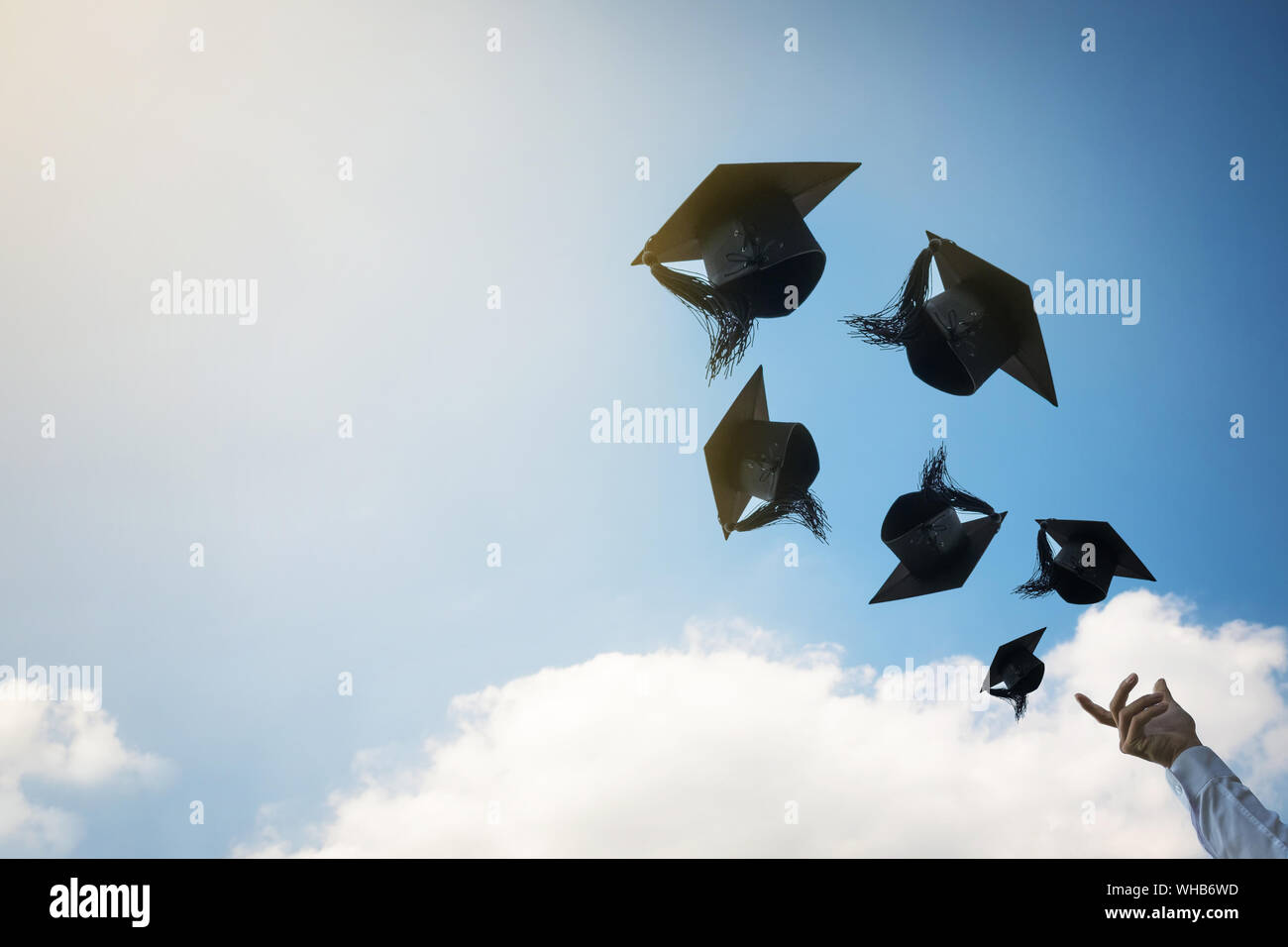 Throwing graduation cap hi-res stock photography and images - Alamy