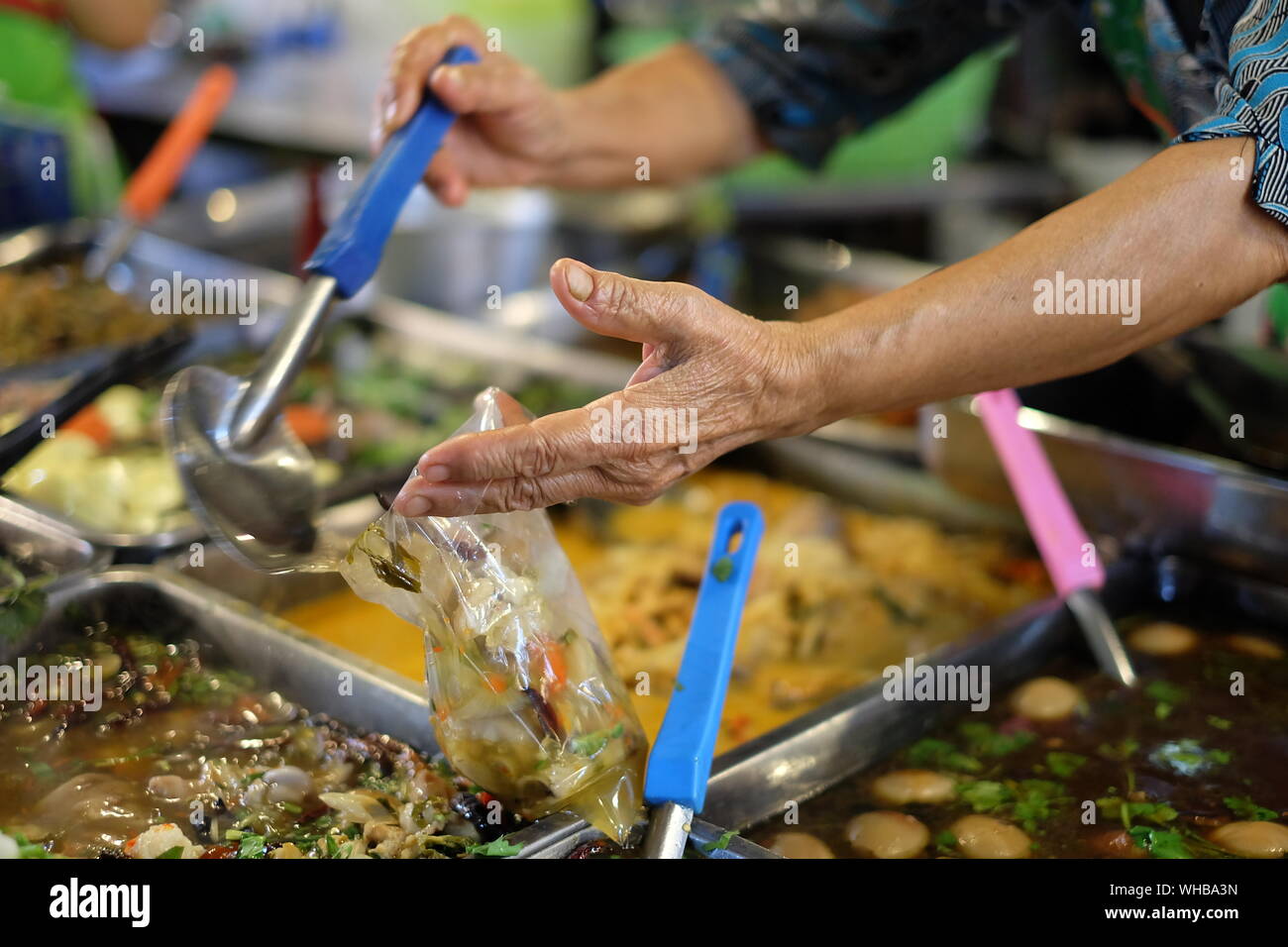 Food packing hi-res stock photography and images - Alamy