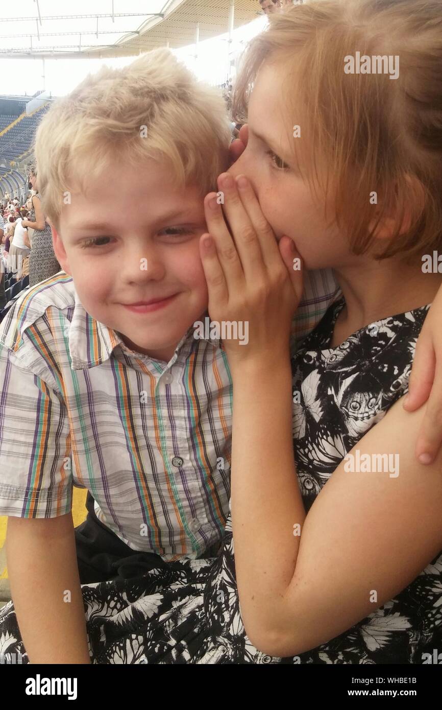 Whispering in girls ear hi-res stock photography and images - Alamy