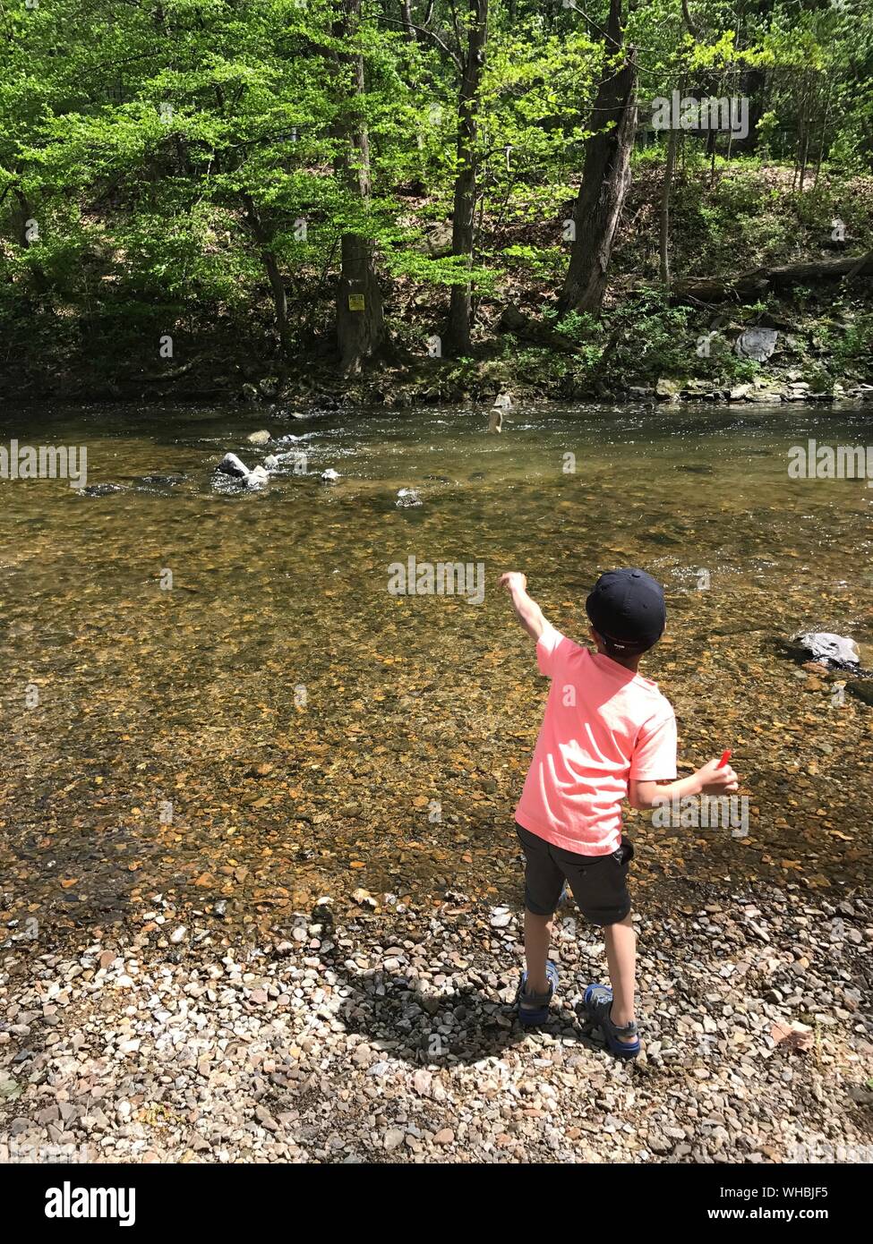 Throwing stones in water hi-res stock photography and images - Alamy