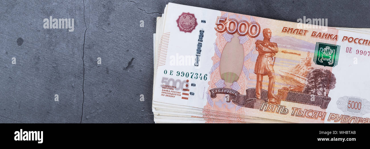 Big stack of Russian money banknotes of five thousand rubles lying on a ...