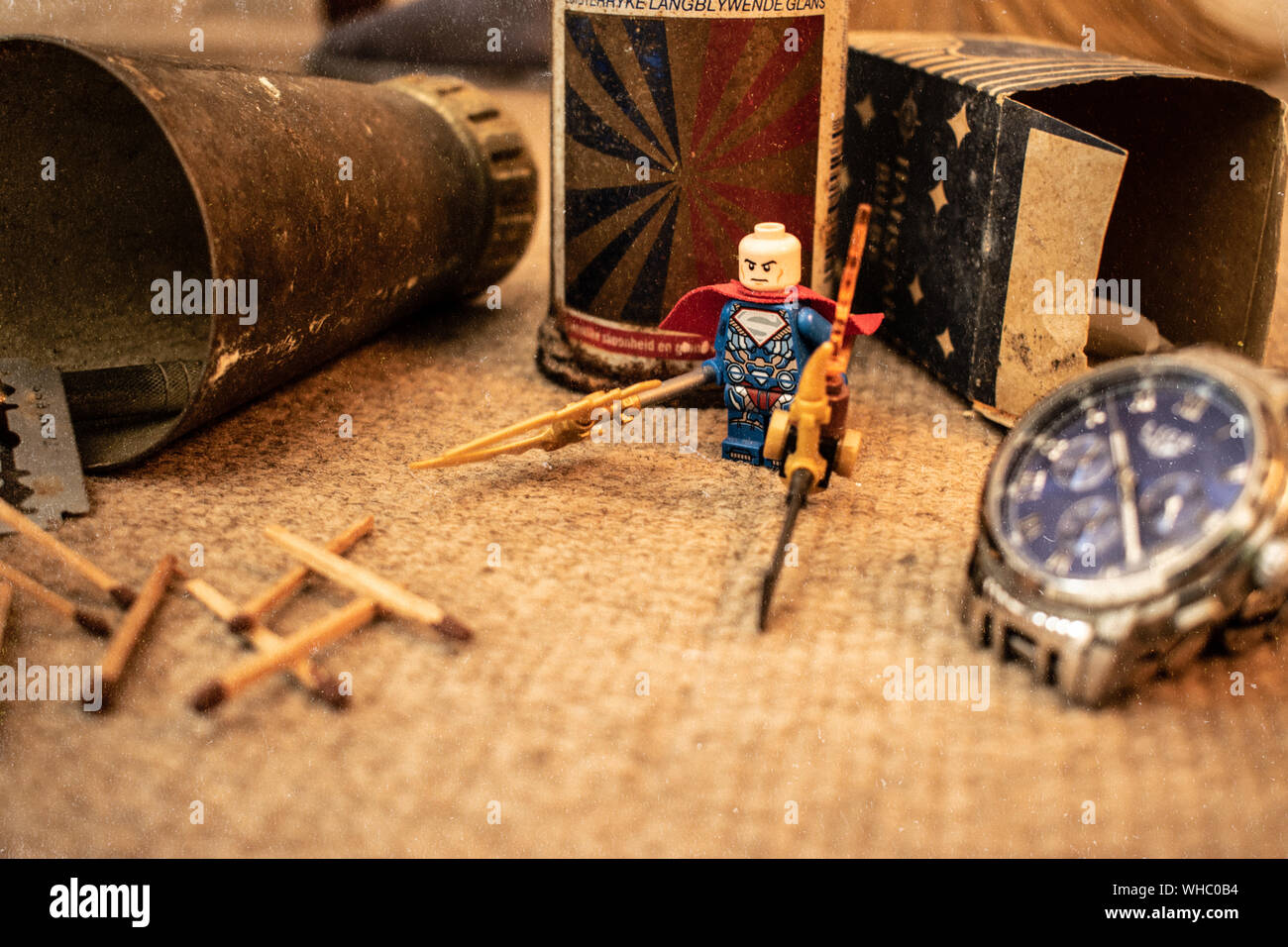 Lego Character surrounded by random objects Stock Photo - Alamy
