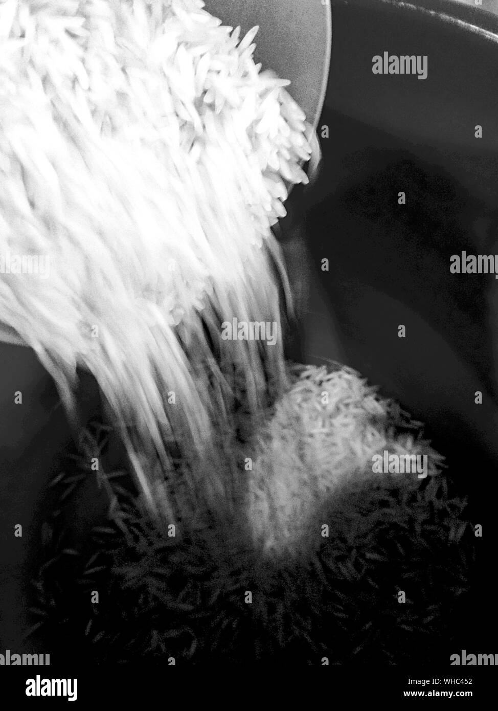 Pouring rice container hi-res stock photography and images - Alamy