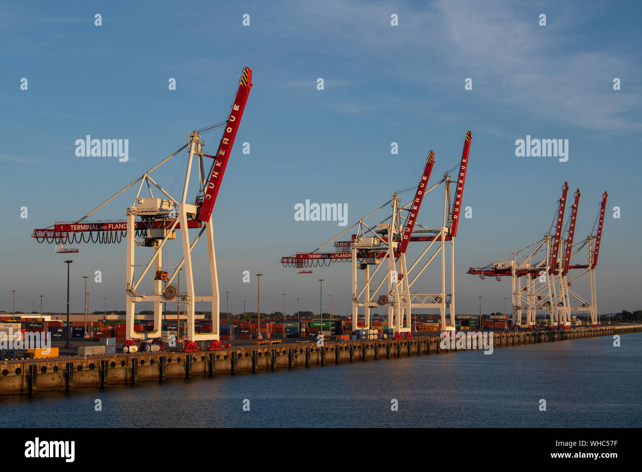 The port of Dunkerque in Northern France. Cranes at the container ...