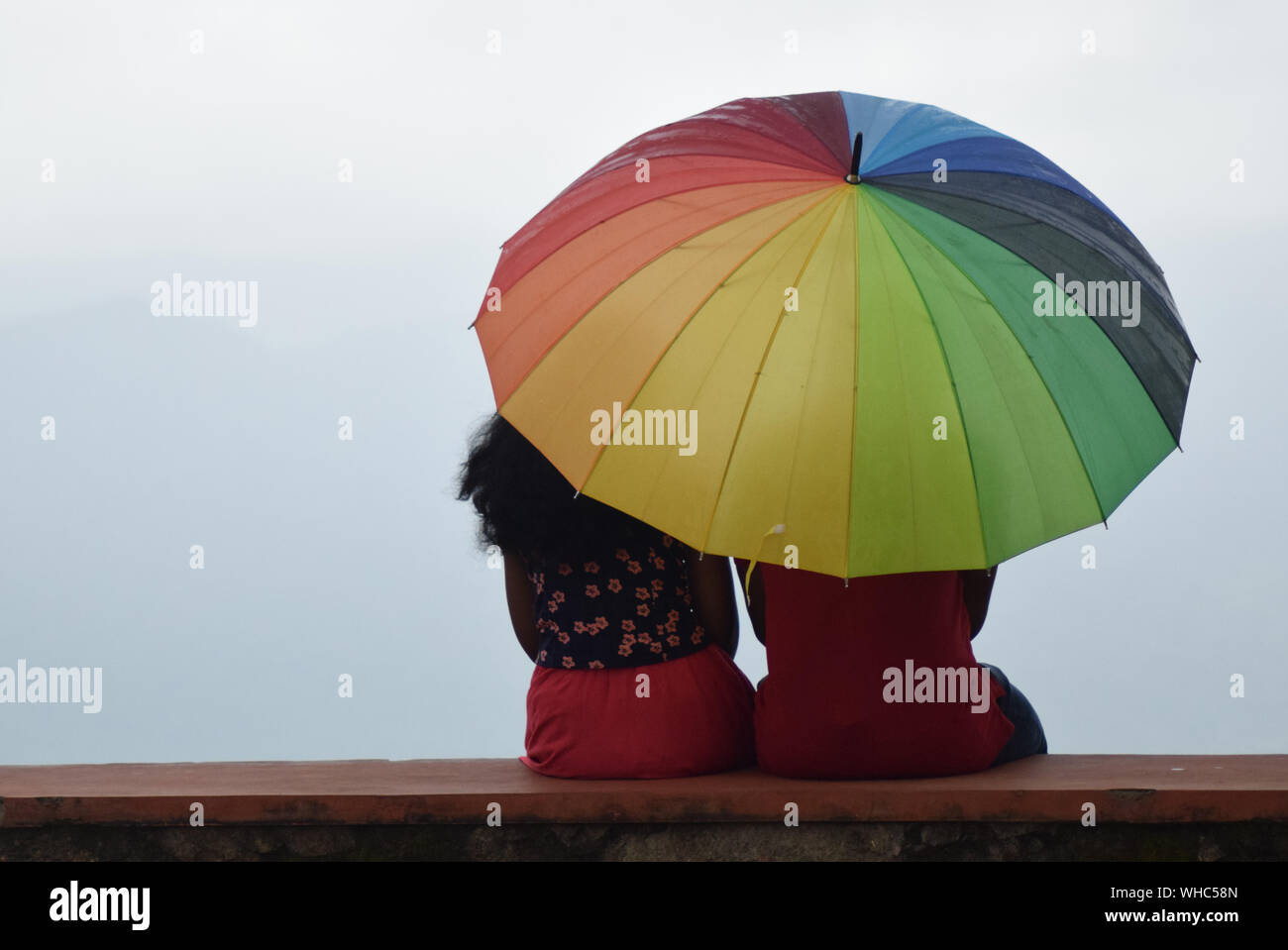 Two people under umbrella hi-res stock photography and images - Alamy