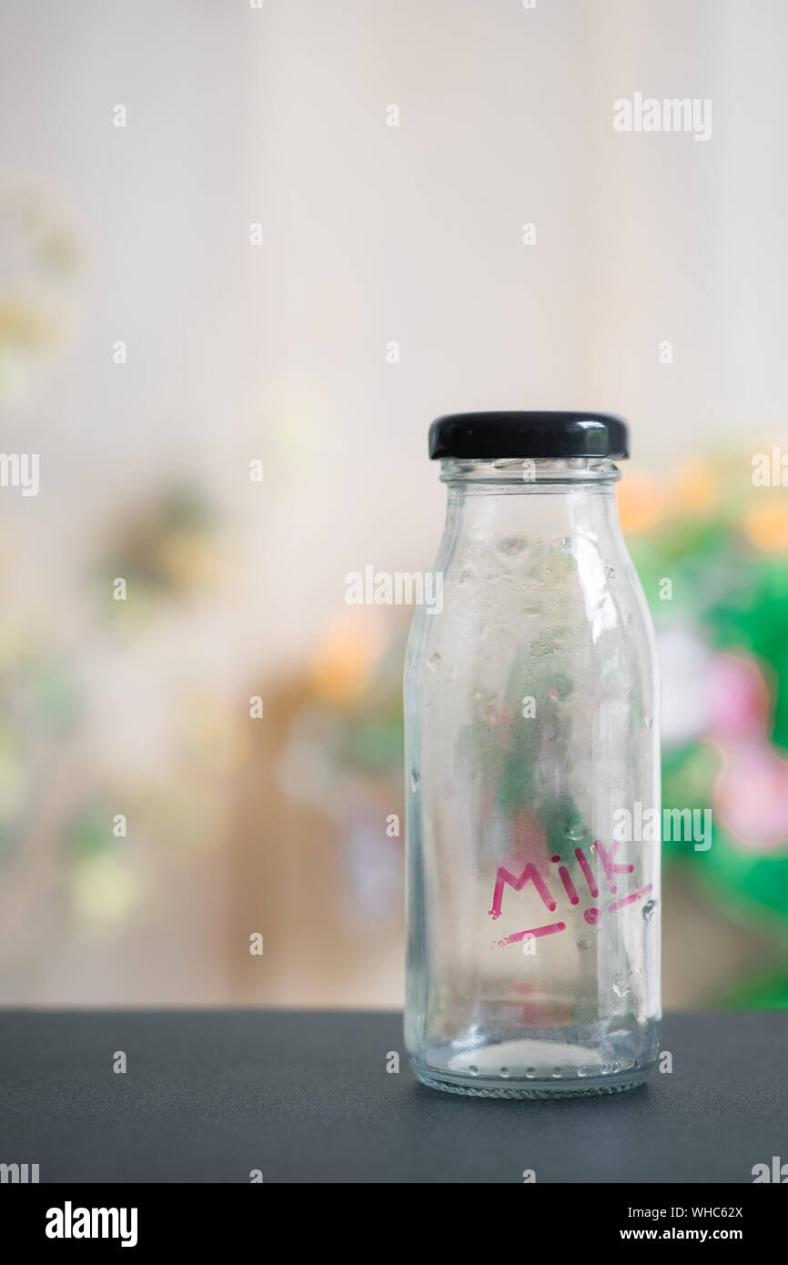 Empty milk bottle hi-res stock photography and images - Alamy