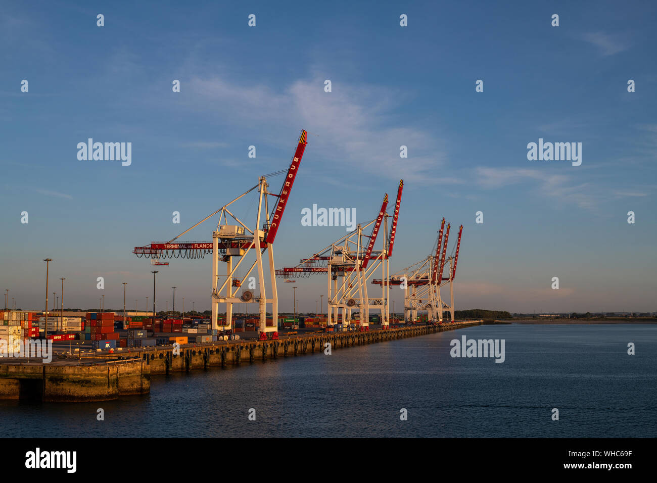 The port of Dunkerque in Northern France. Cranes at the container ...