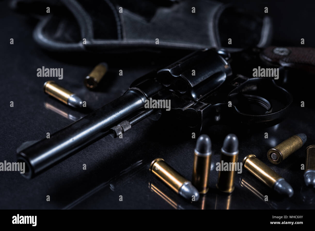Pistol bullet gun table hi-res stock photography and images - Alamy