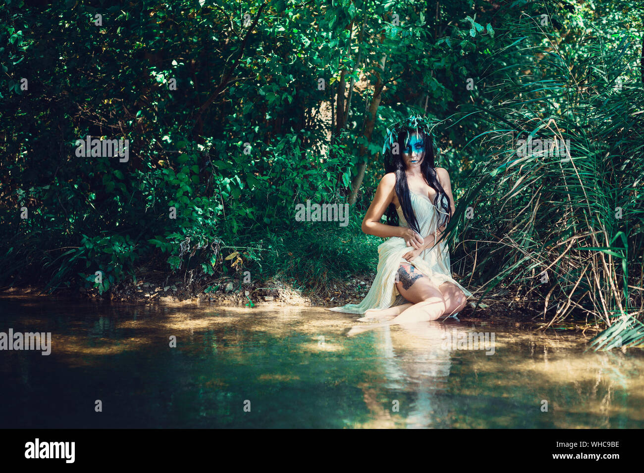 Young drown woman in a poetic representation. The concept of the undead ...