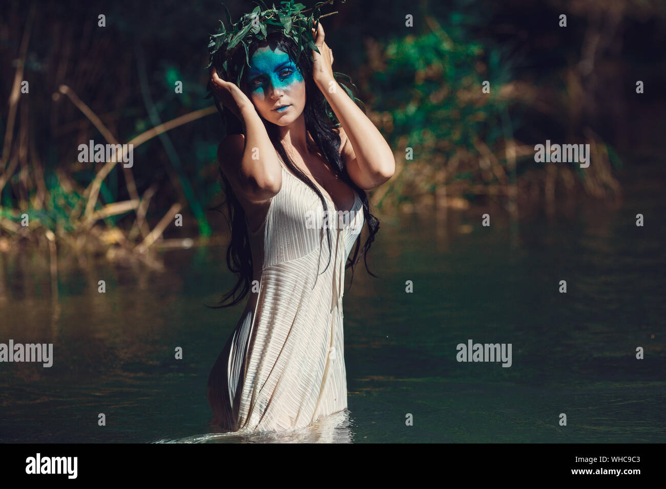 Young drown woman in a poetic representation. The concept of the undead ...