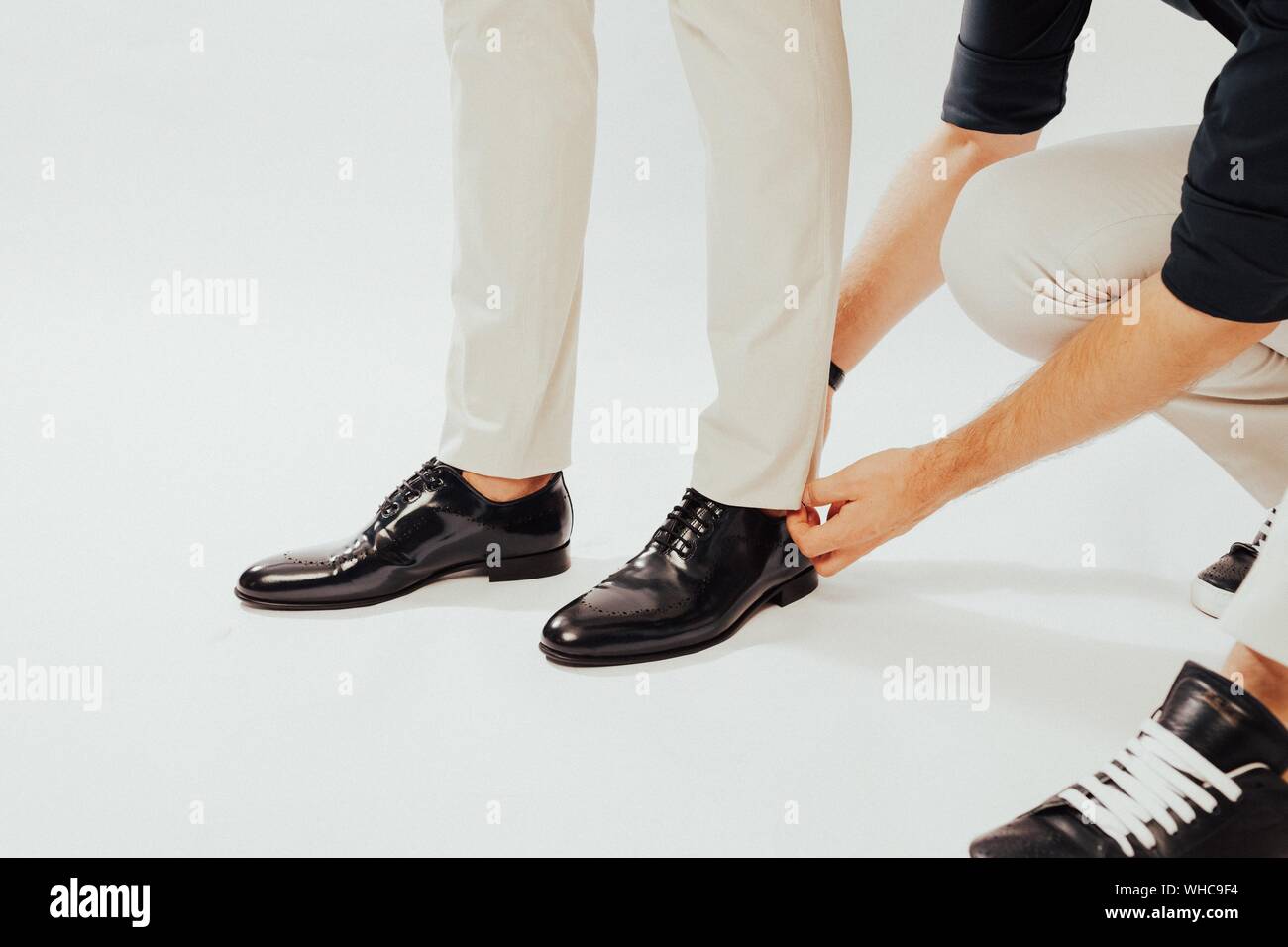 Adjusting shoe hi-res stock photography and images - Alamy
