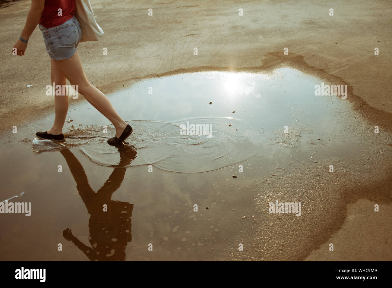 Reflection woman puddle city hi-res stock photography and images - Alamy