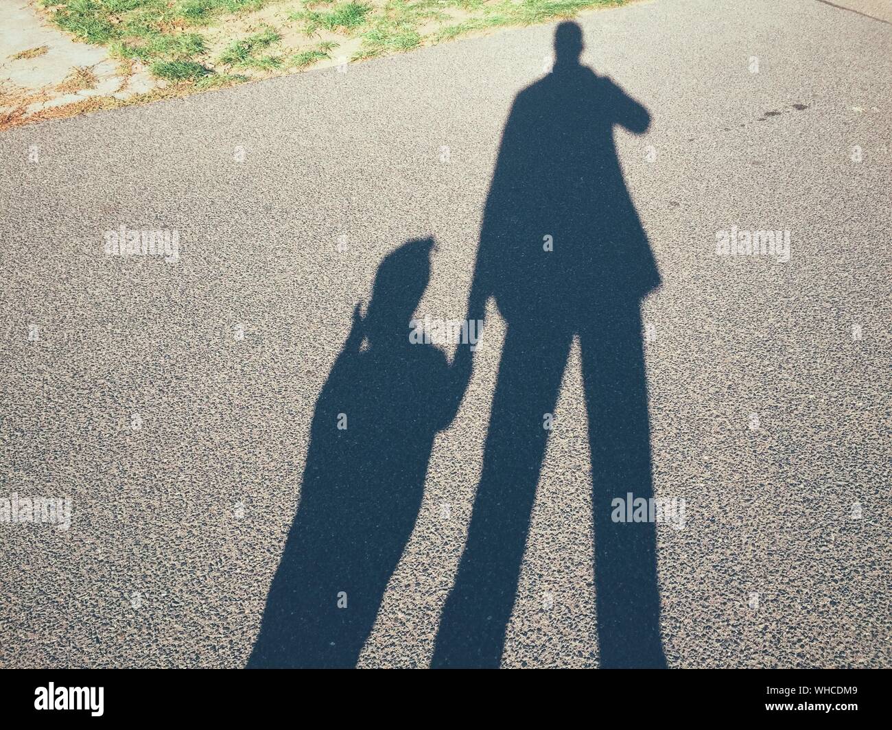 Child parent shadow hi-res stock photography and images - Alamy