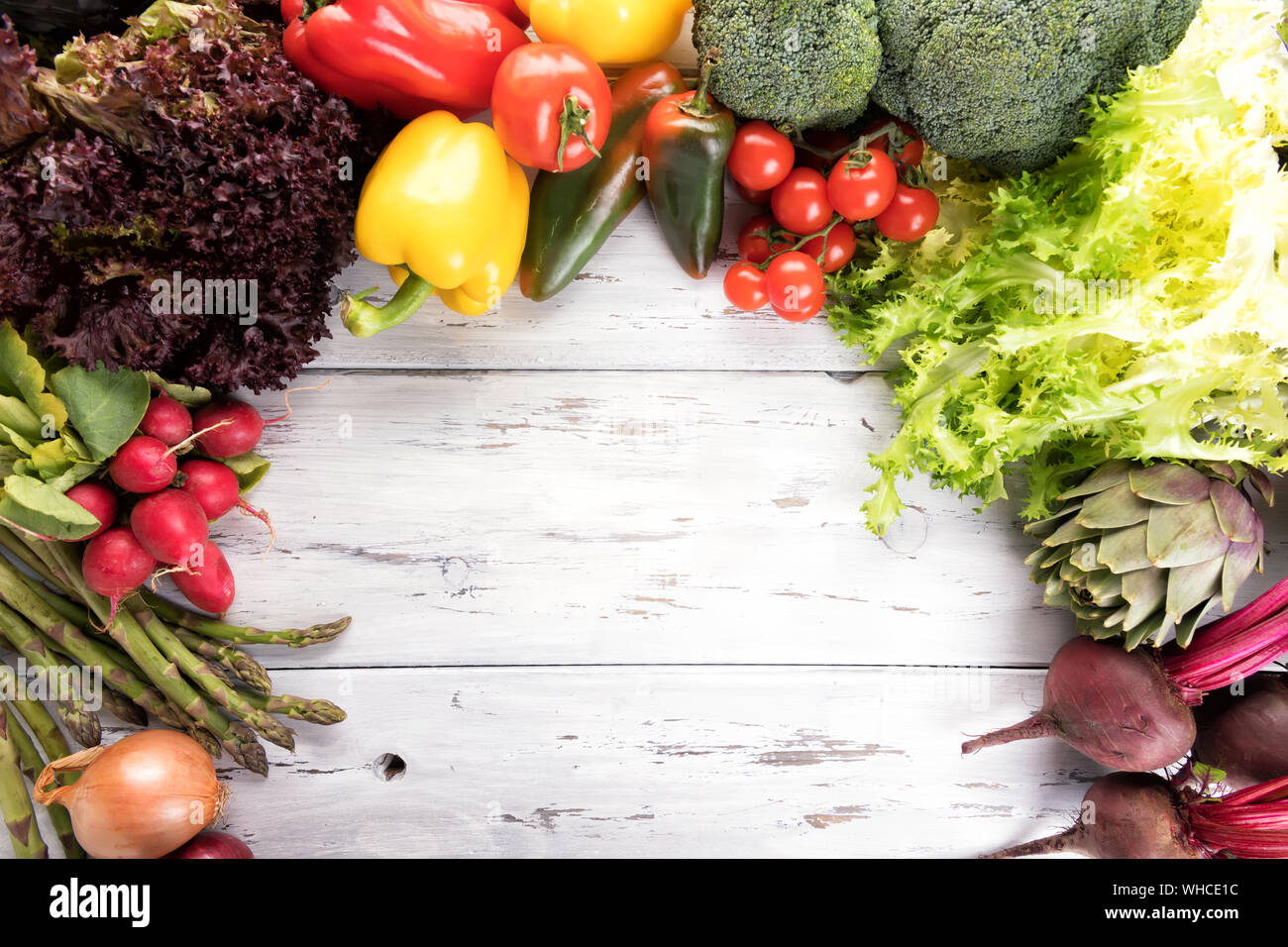 Organic food background, fresh vegetables old light wooden shabby ...