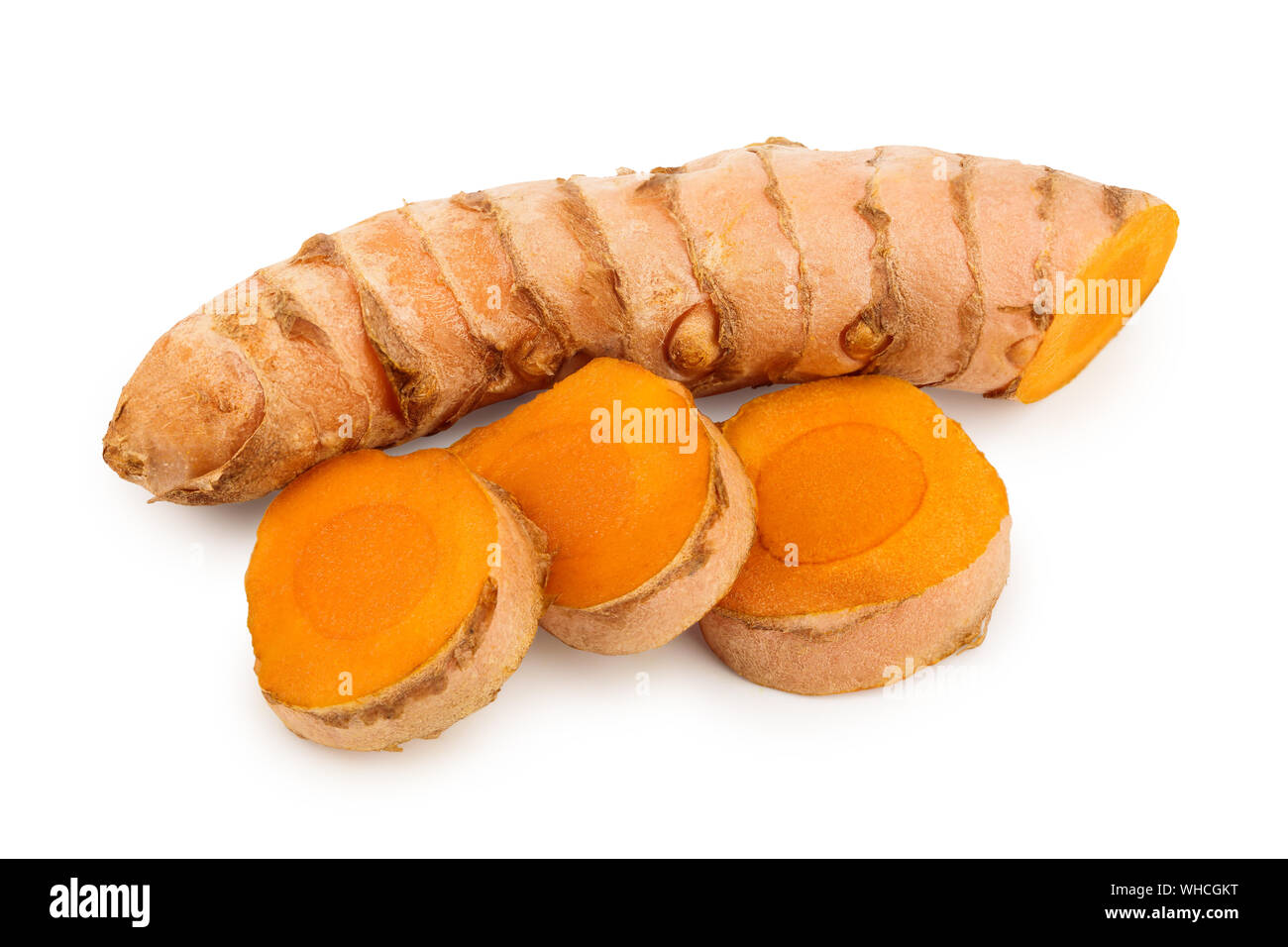 turmeric root and slices isolated on white background Stock Photo - Alamy