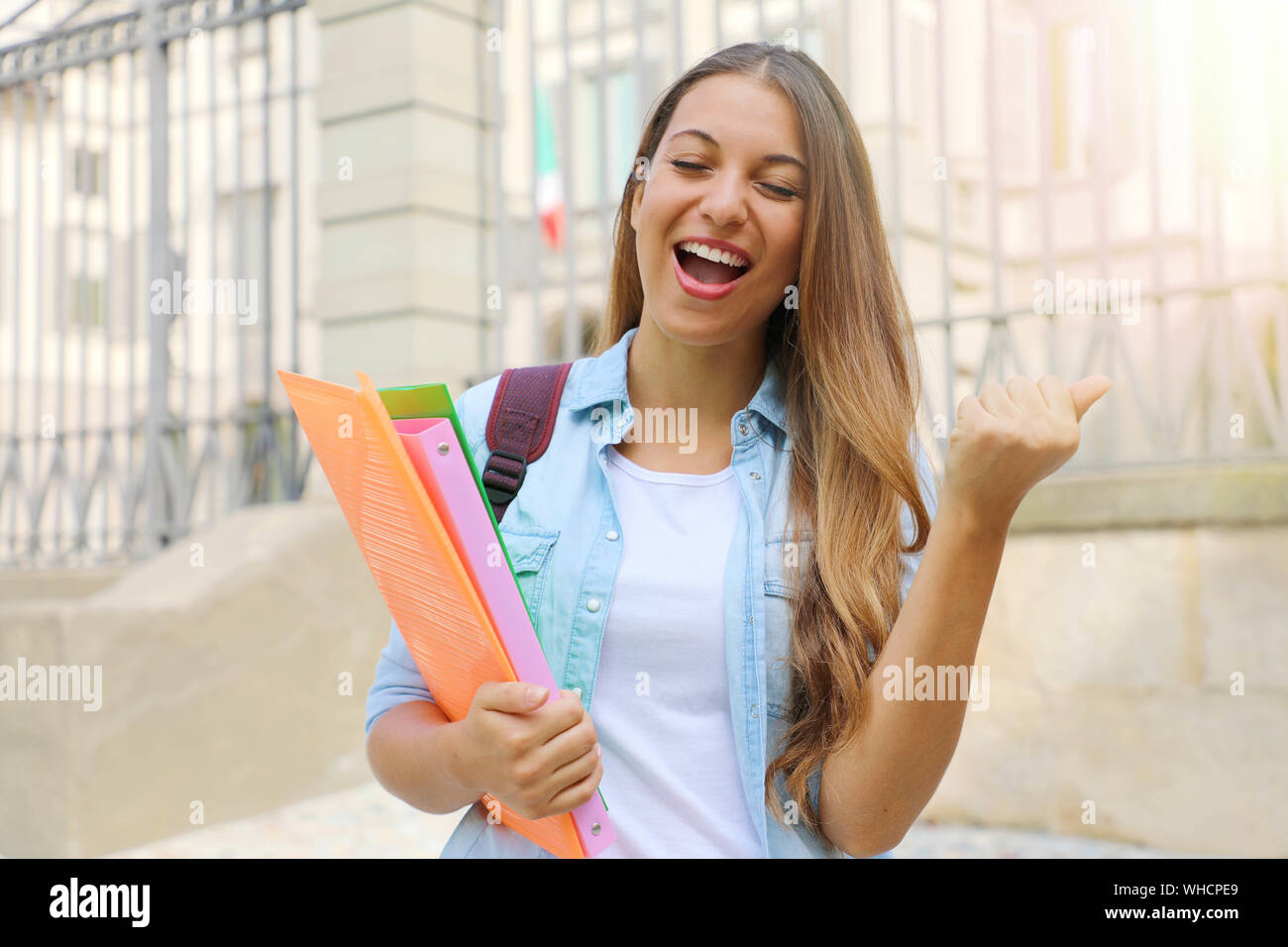 Happy student girl doing student exchange programme in Italy. Excited ...