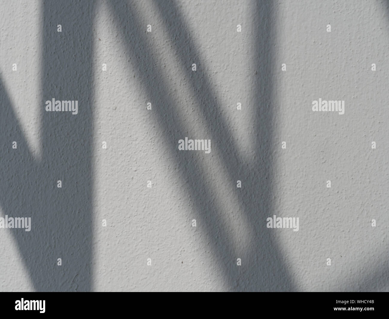 Grey shadow on a white wall Stock Photo - Alamy