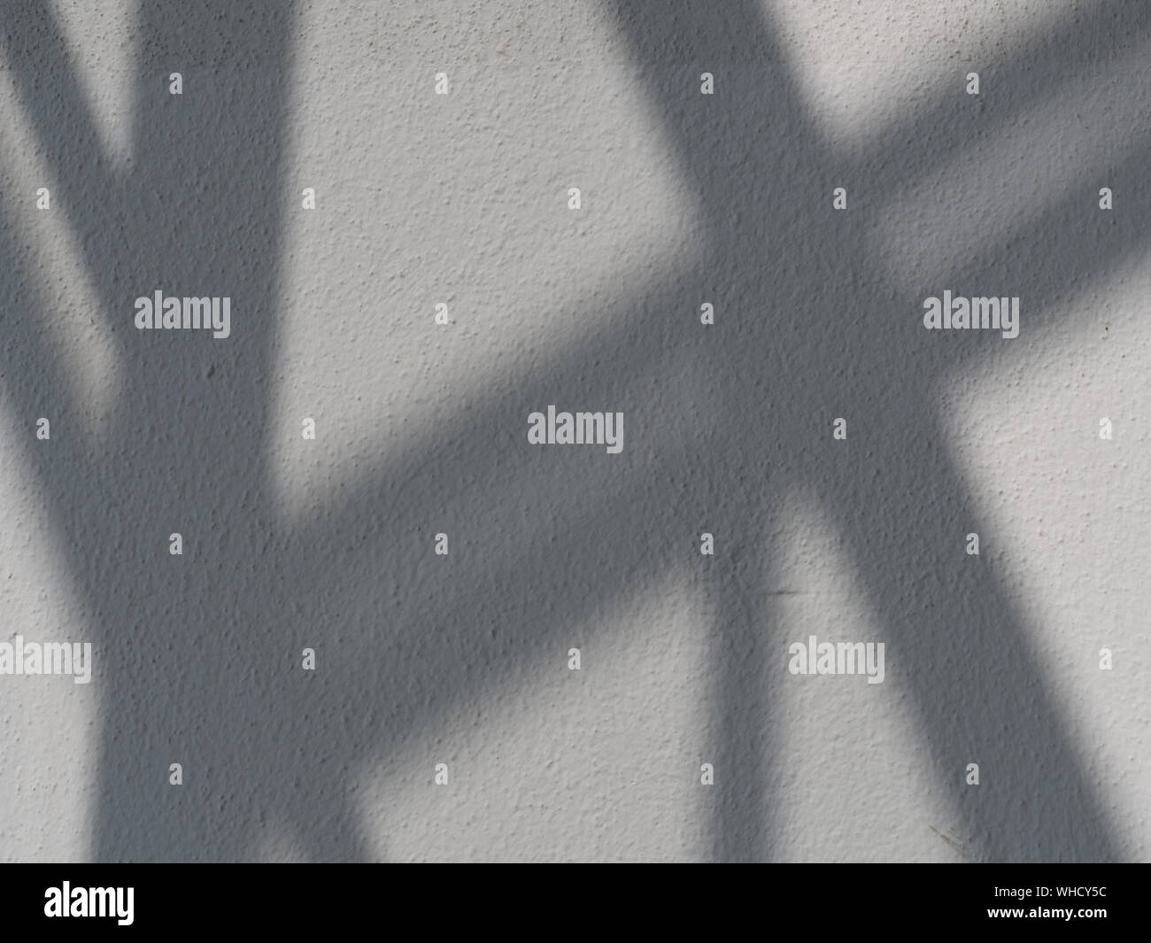 Grey shadow on a white wall Stock Photo - Alamy