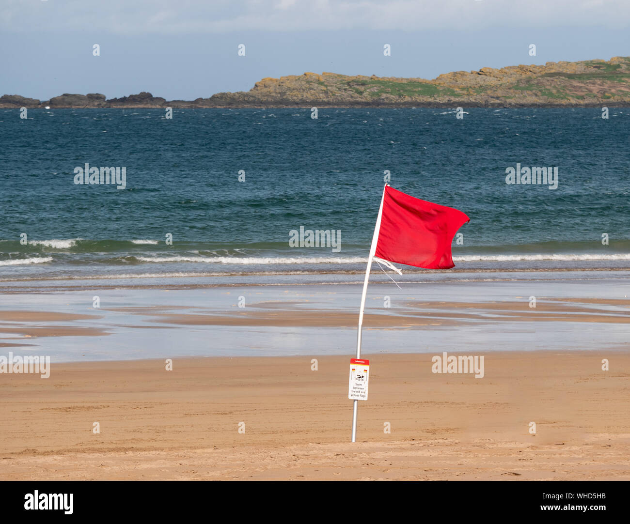 Red flag on beach hi-res stock photography and images - Alamy