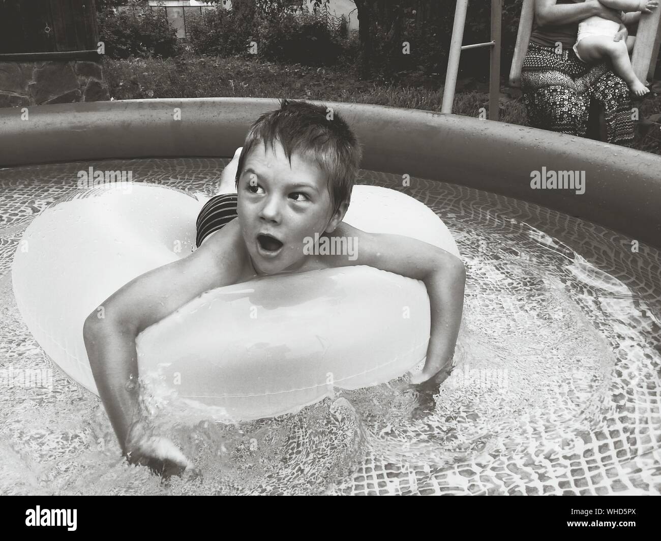 Floating at the pool hi-res stock photography and images - Alamy