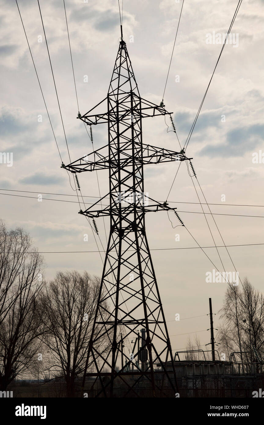 High-voltage power transmission line with substation and towers with ...