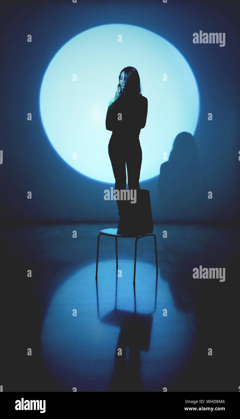 Woman spotlight hi-res stock photography and images - Alamy