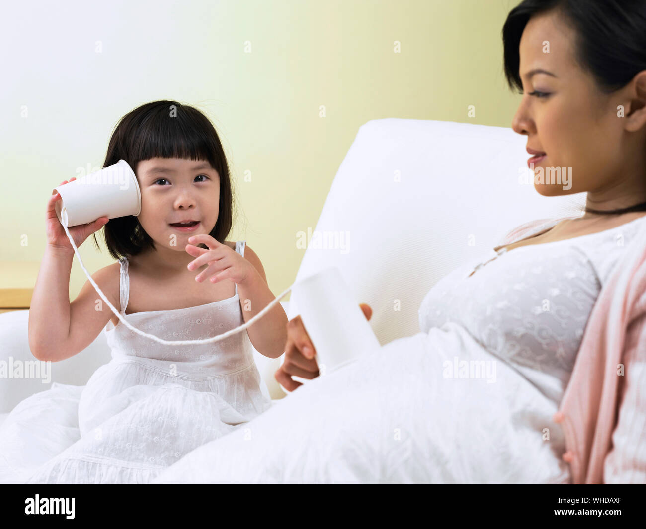 Mother listening hi-res stock photography and images - Alamy