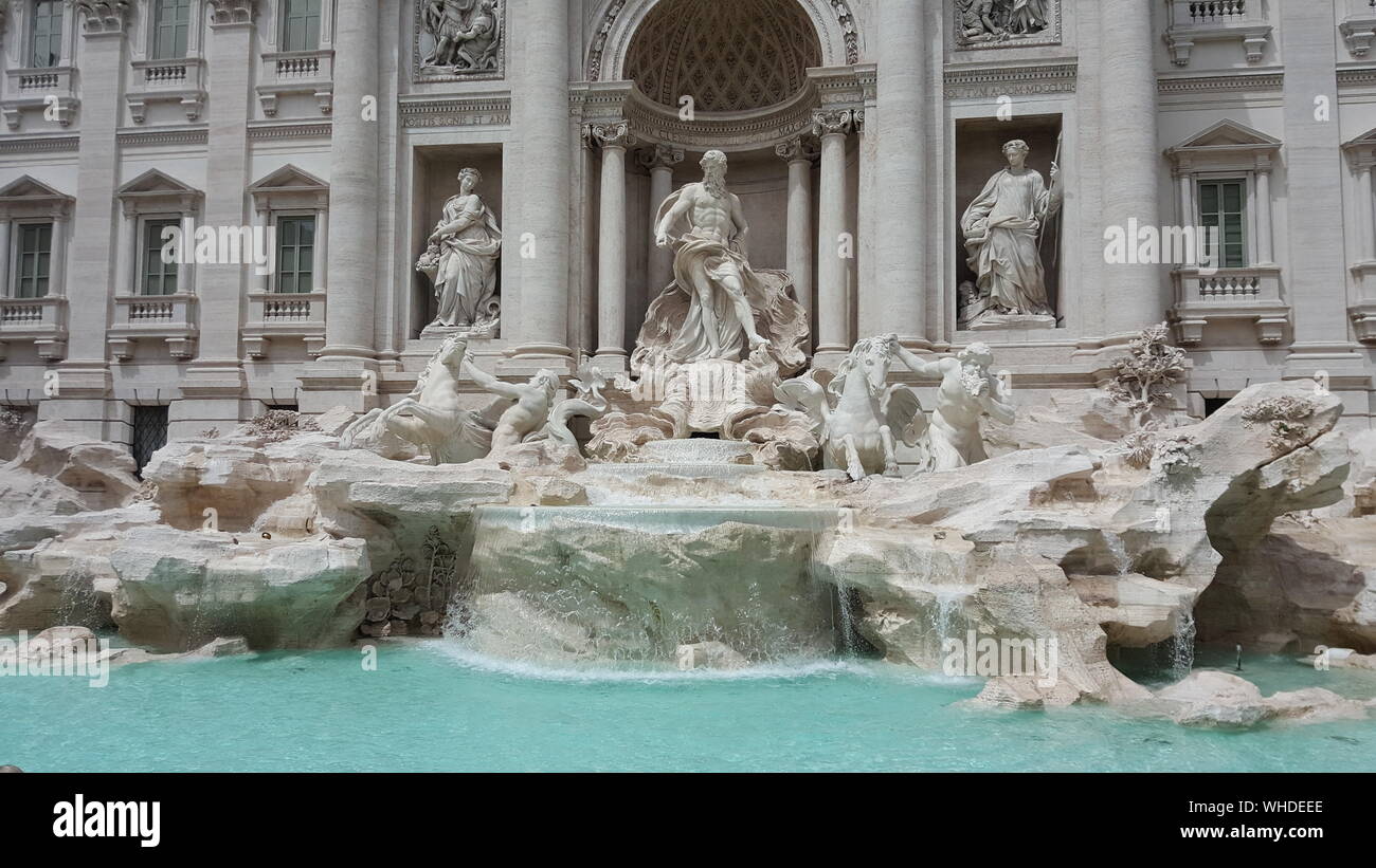 Statues of the famous trevi fountain hi-res stock photography and ...