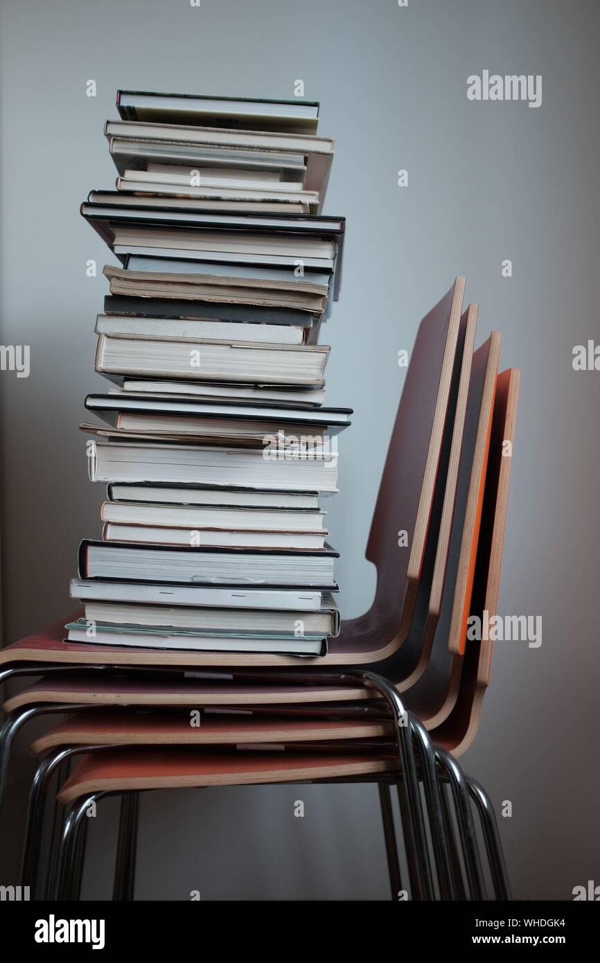 Books on chair hi-res stock photography and images - Alamy