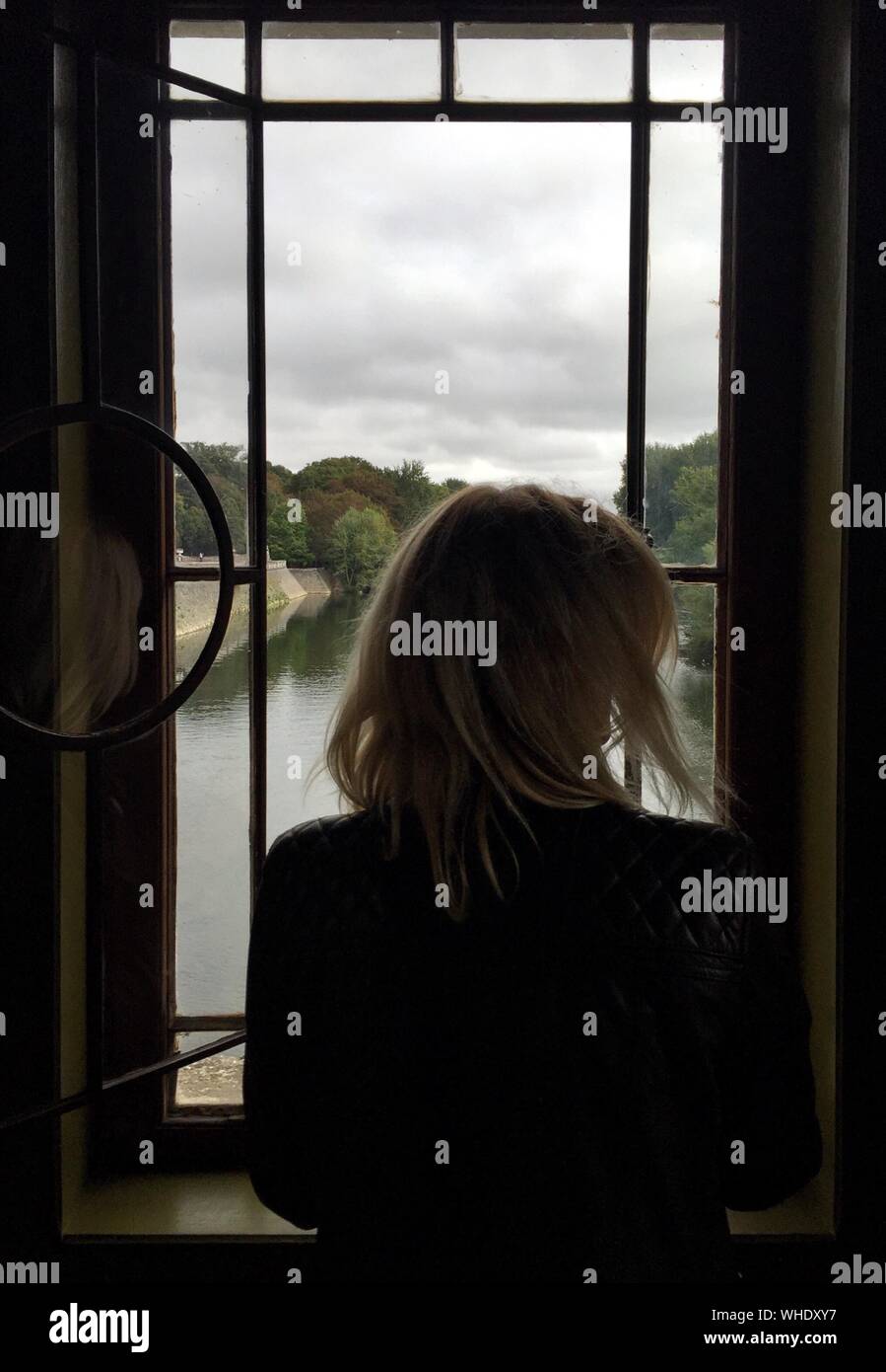 Women window lake hi-res stock photography and images - Alamy