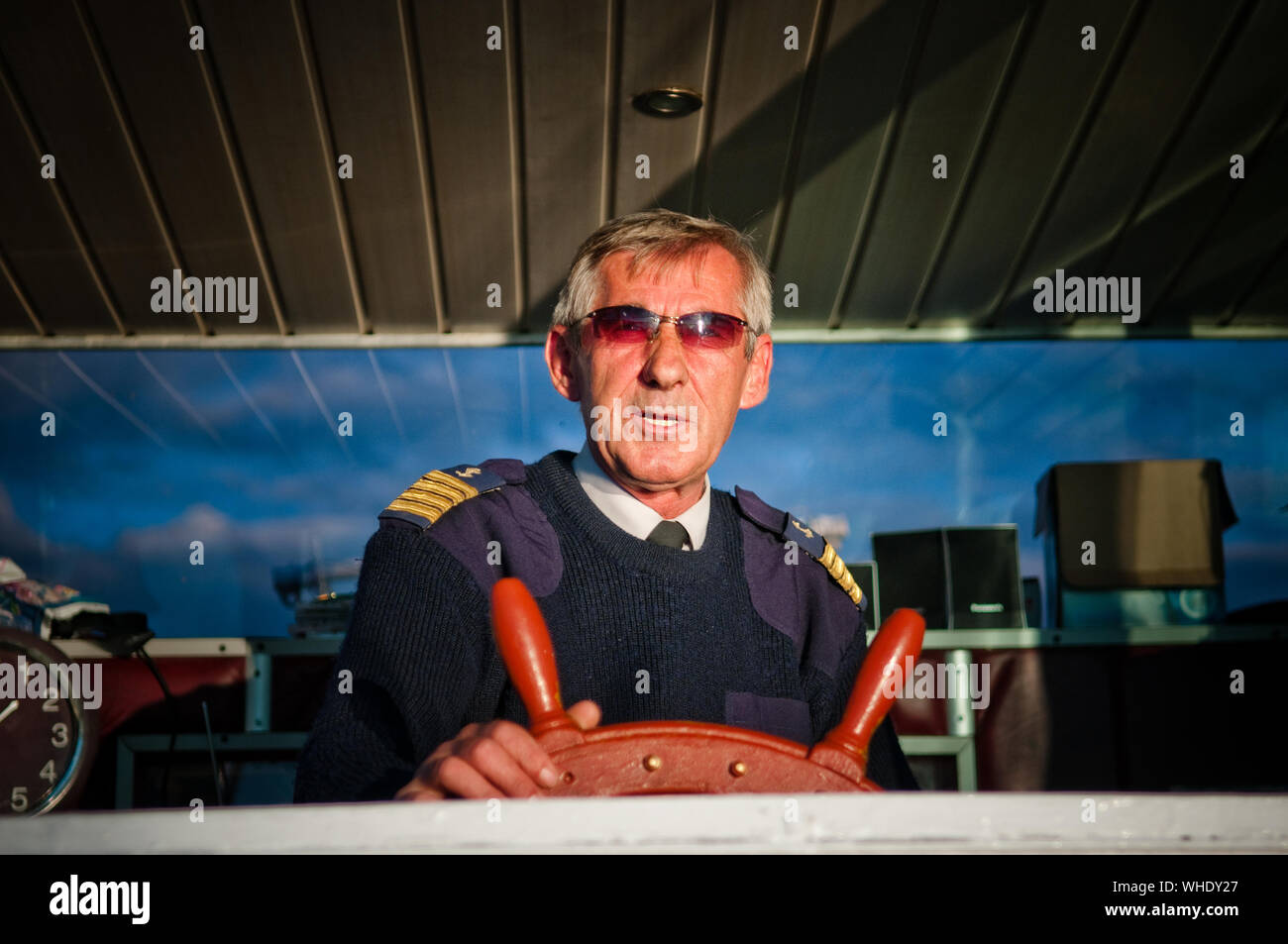 Ship's captain at work, holds the rudder Stock Photo - Alamy