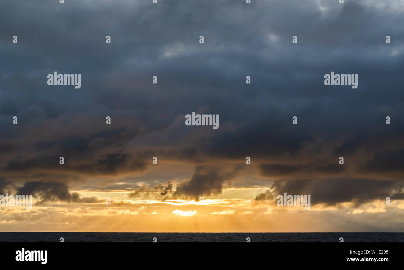 Dramatic sunset at sea after storm Stock Photo - Alamy