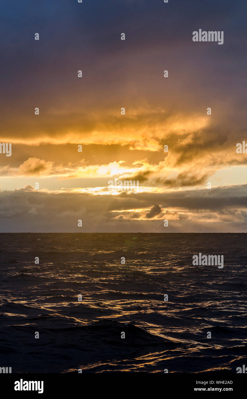 Dramatic sunset at sea after storm Stock Photo - Alamy