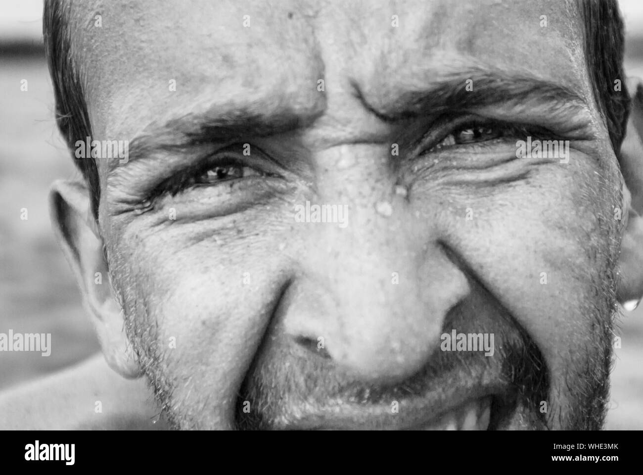 A black and white portrait of a man with a piercing, painful look Stock ...