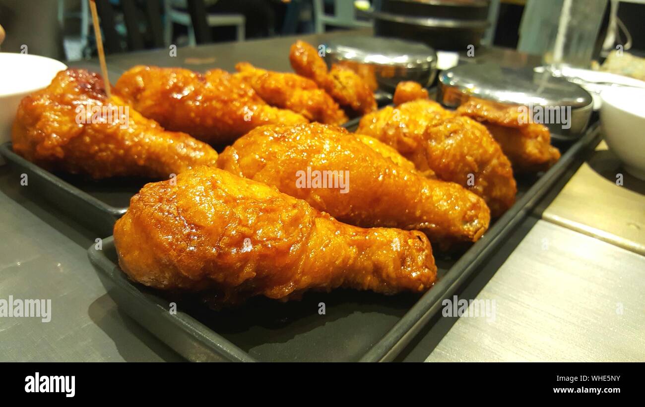 Eat chicken leg hi-res stock photography and images - Alamy