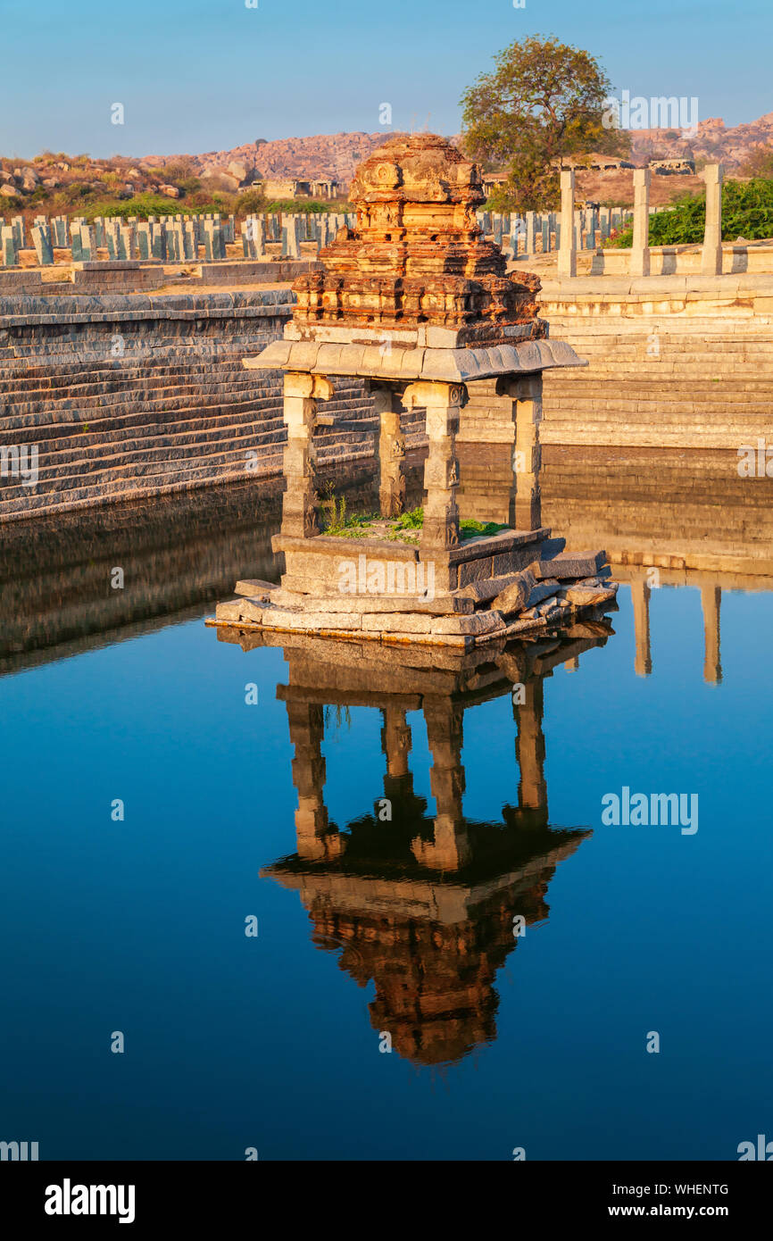 Temple and water tank at Hampi, the centre of the Hindu Vijayanagara ...
