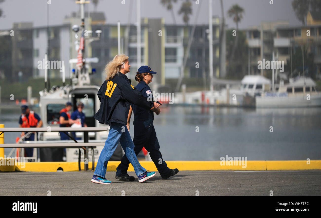 Oxnard, USA. 2nd Sep, 2019. FBI and Coast Guard personnel work at the U ...