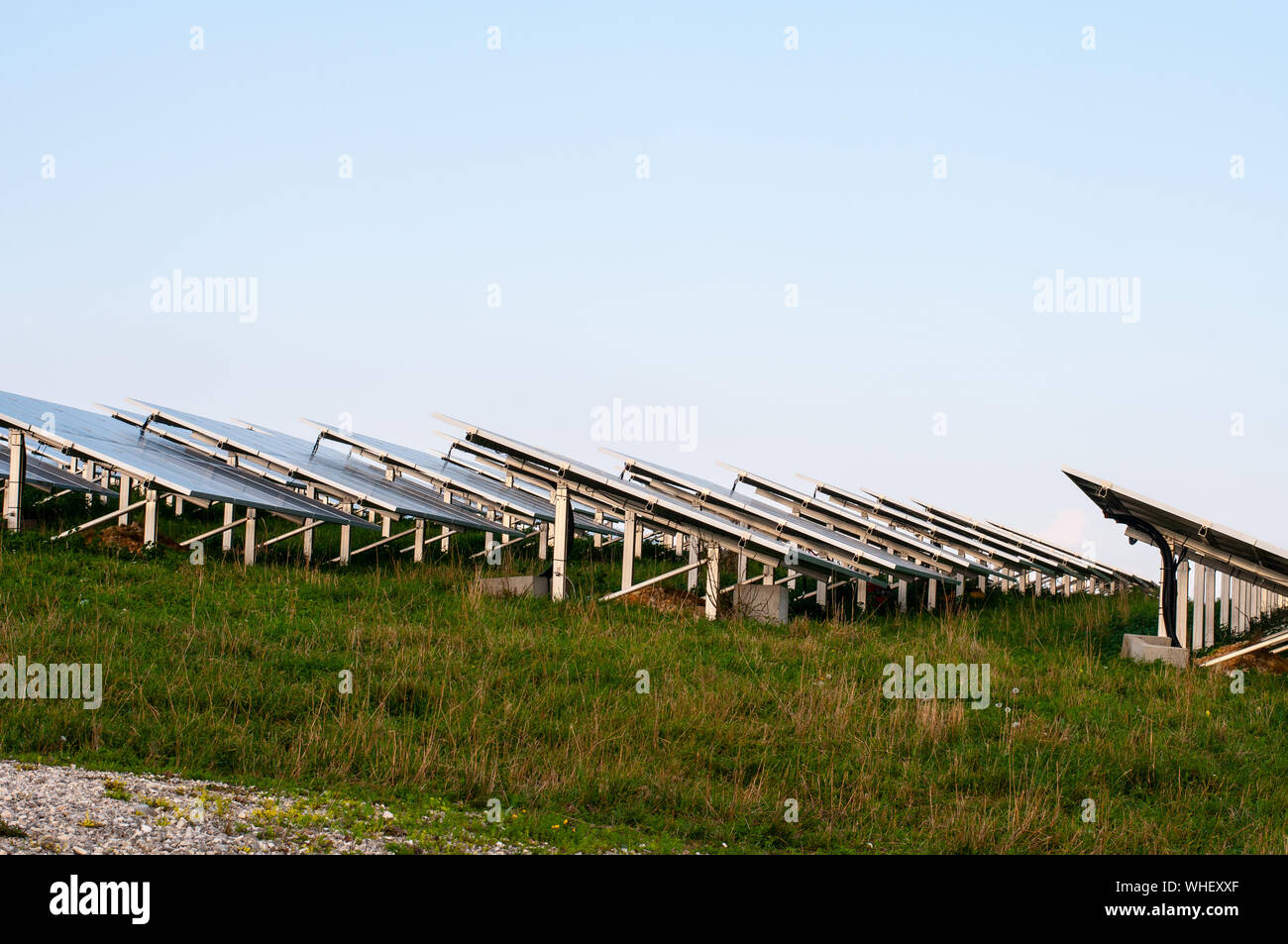 solar panels installed on meadow for sustainable power generation Stock ...